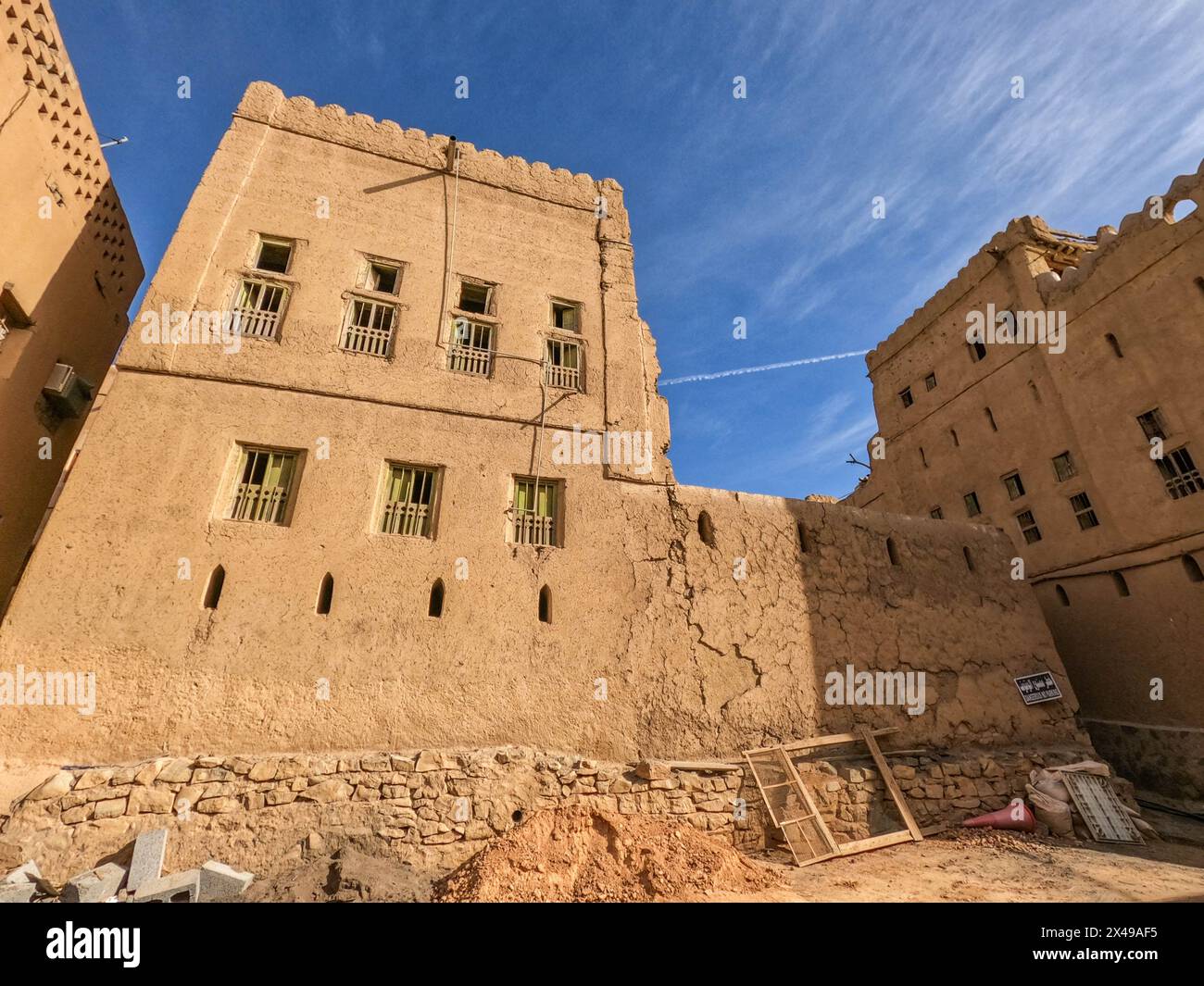 Falling down mud-brick ruins of the old village in Al Hamra, Oman Stock ...