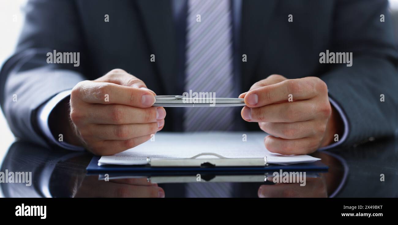 Male arm in suit and tie fill form clipped Stock Photo - Alamy
