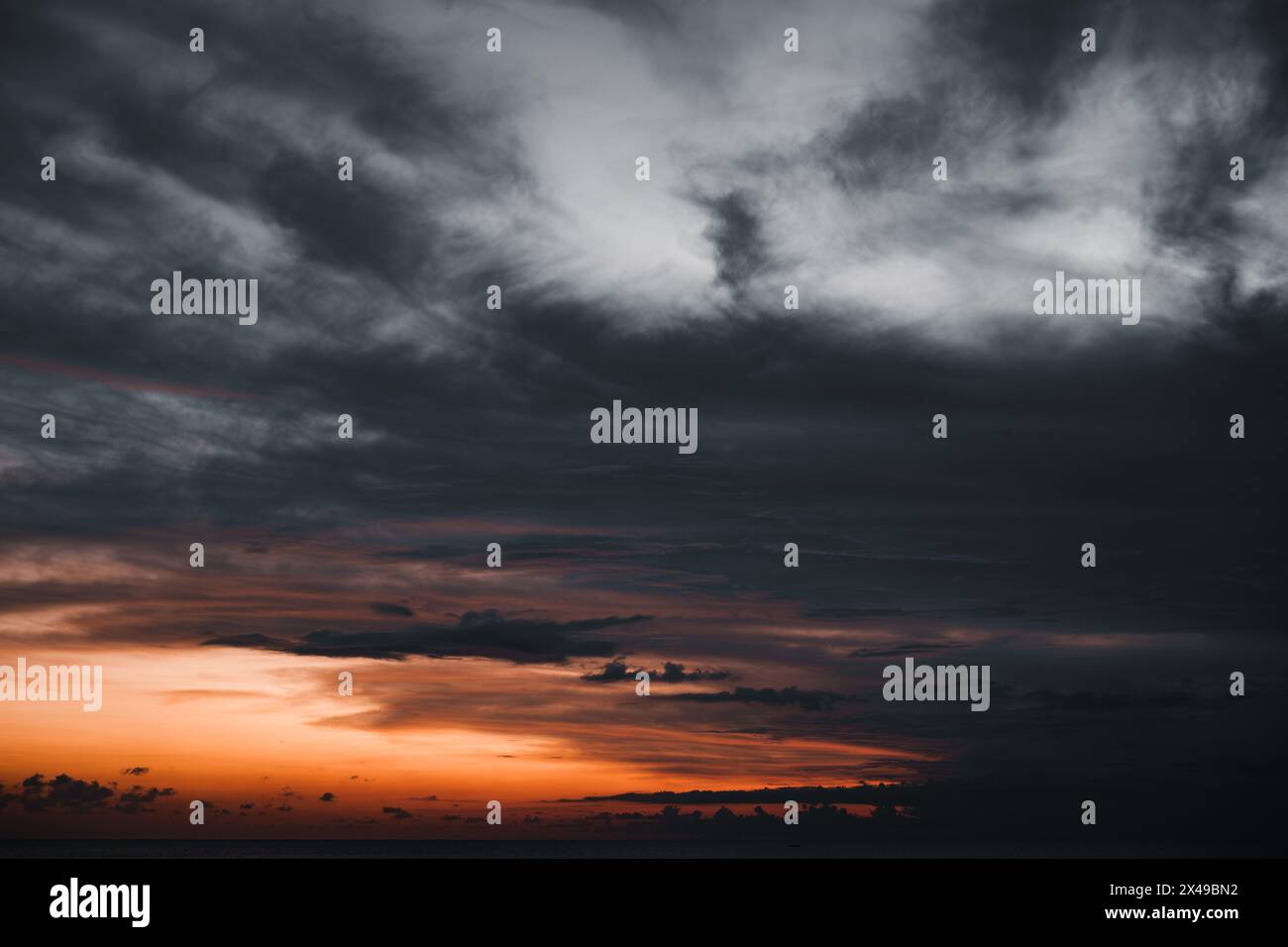 Dramatic and moody clouds in the sky. Contrast of colors from deep ...