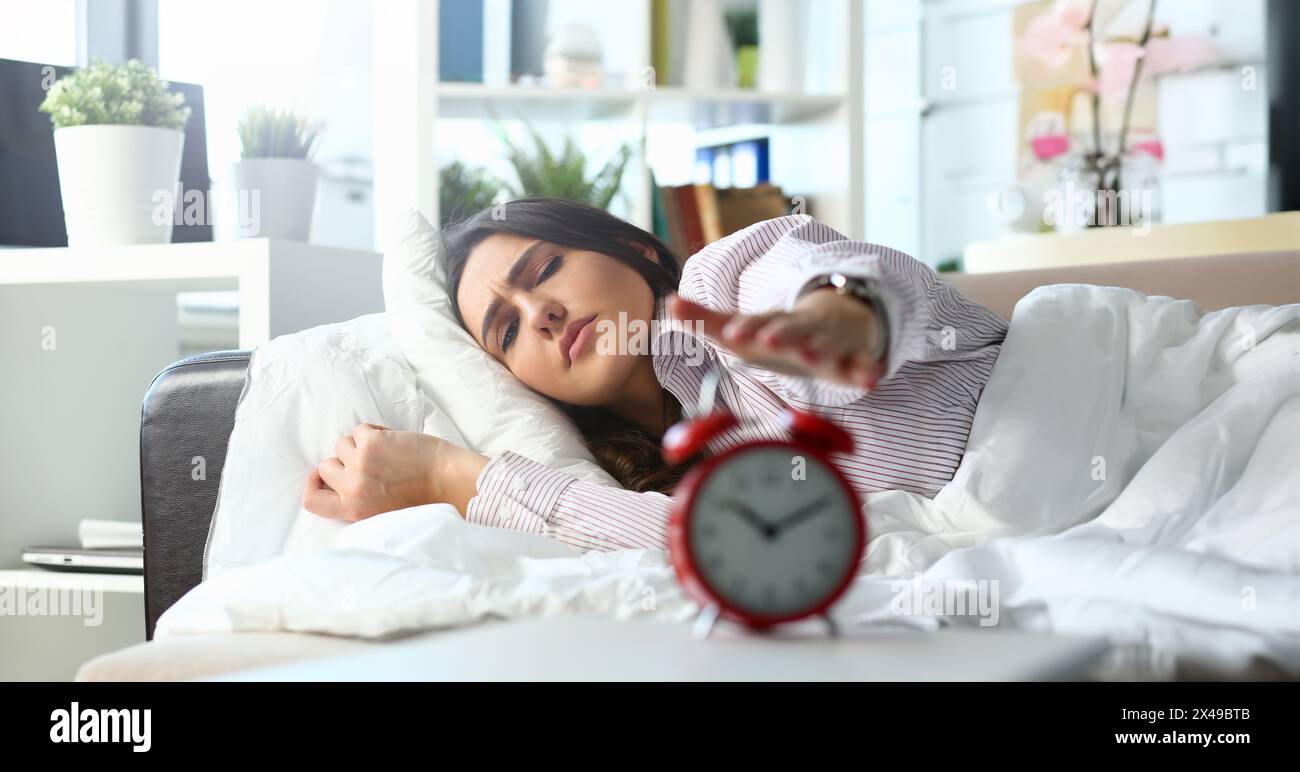 Sleepy young woman portrait with one Stock Photo - Alamy