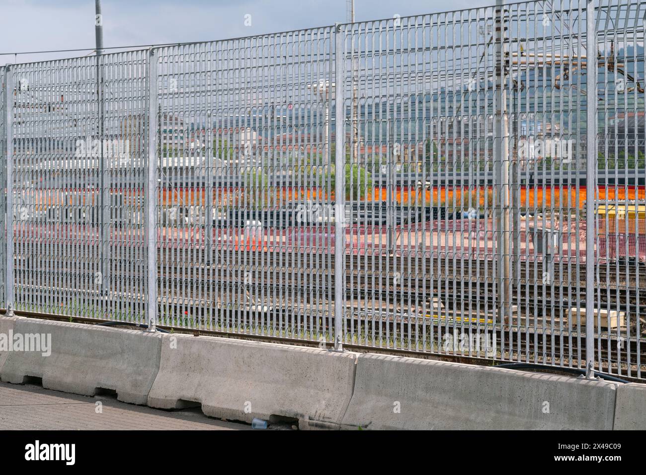 borders, the fence with steel metal grate. Detail of the grate is made ...