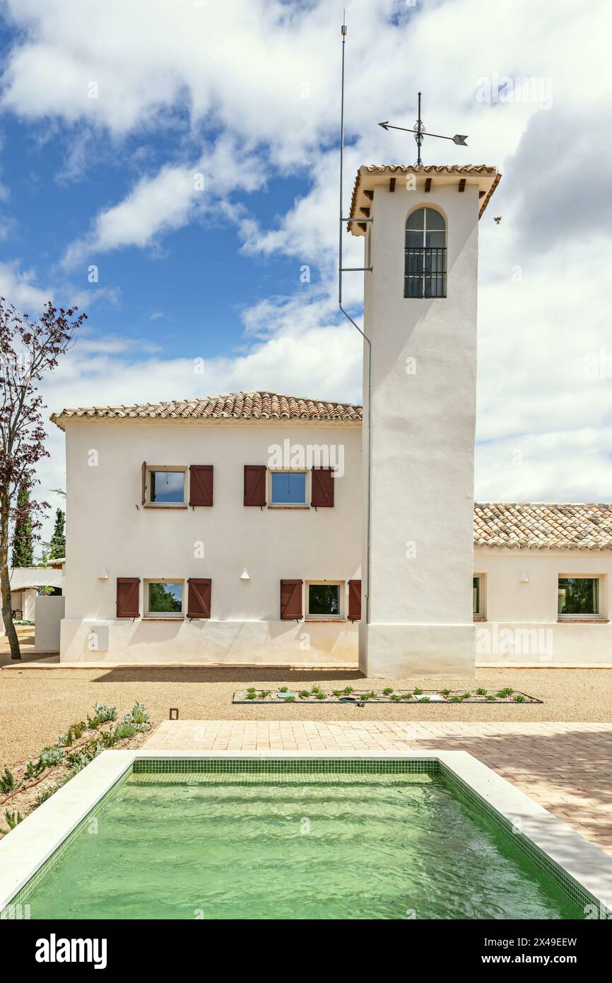 an Andalusian cortijo-style country house with a watchtower and a ...