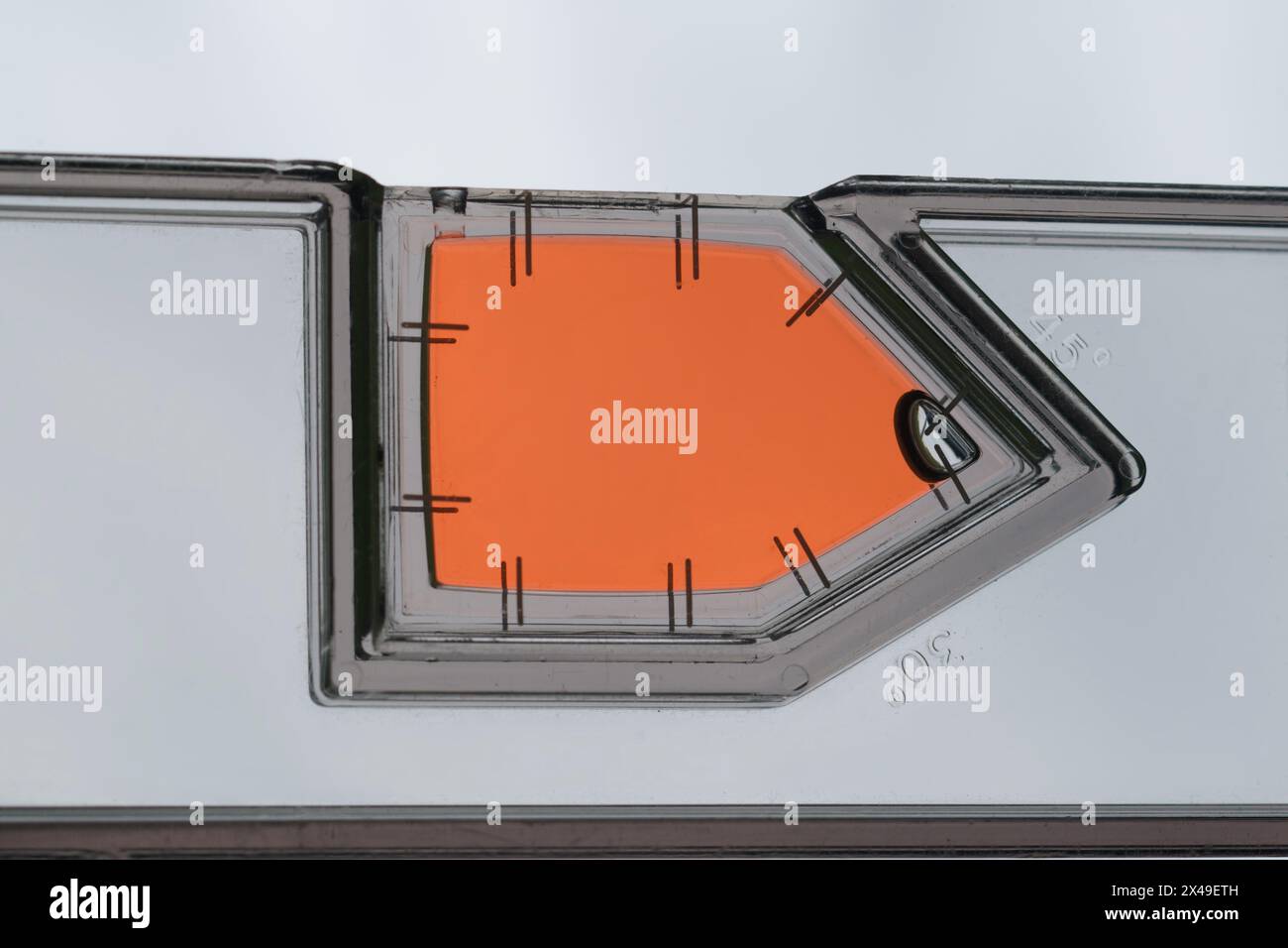 A spirit level is used to accurately measure whether a surface is level ...