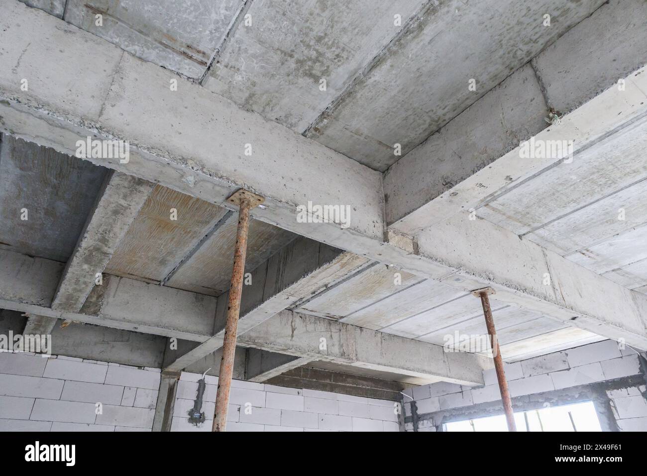 building under construction with iron steel support concrete beams ...