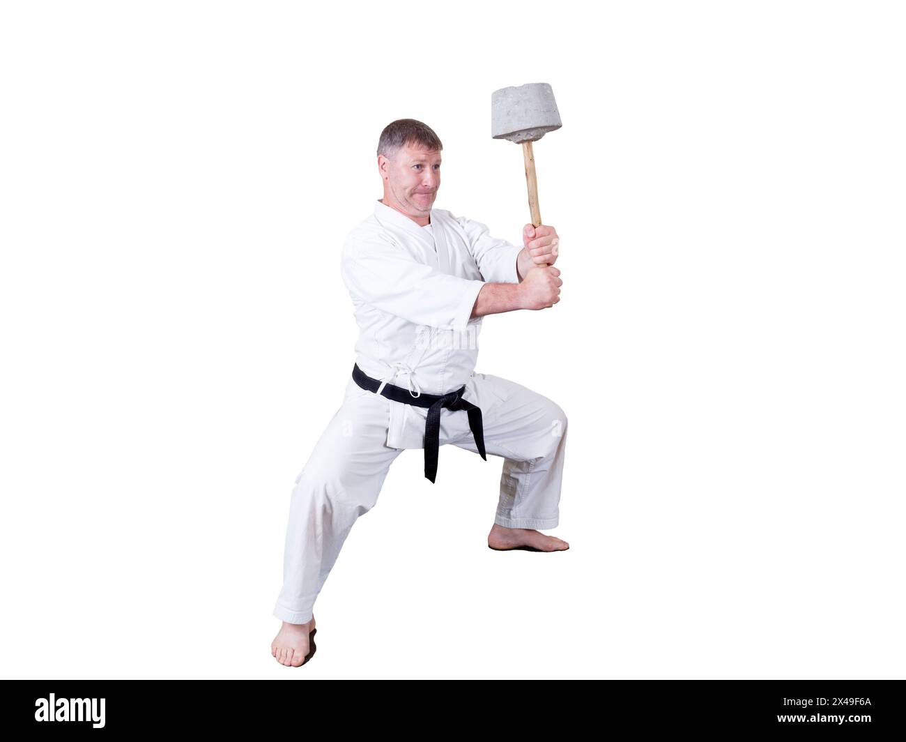 Adult athlete performs formal goju-ryu exercises. It is isolated in a ...