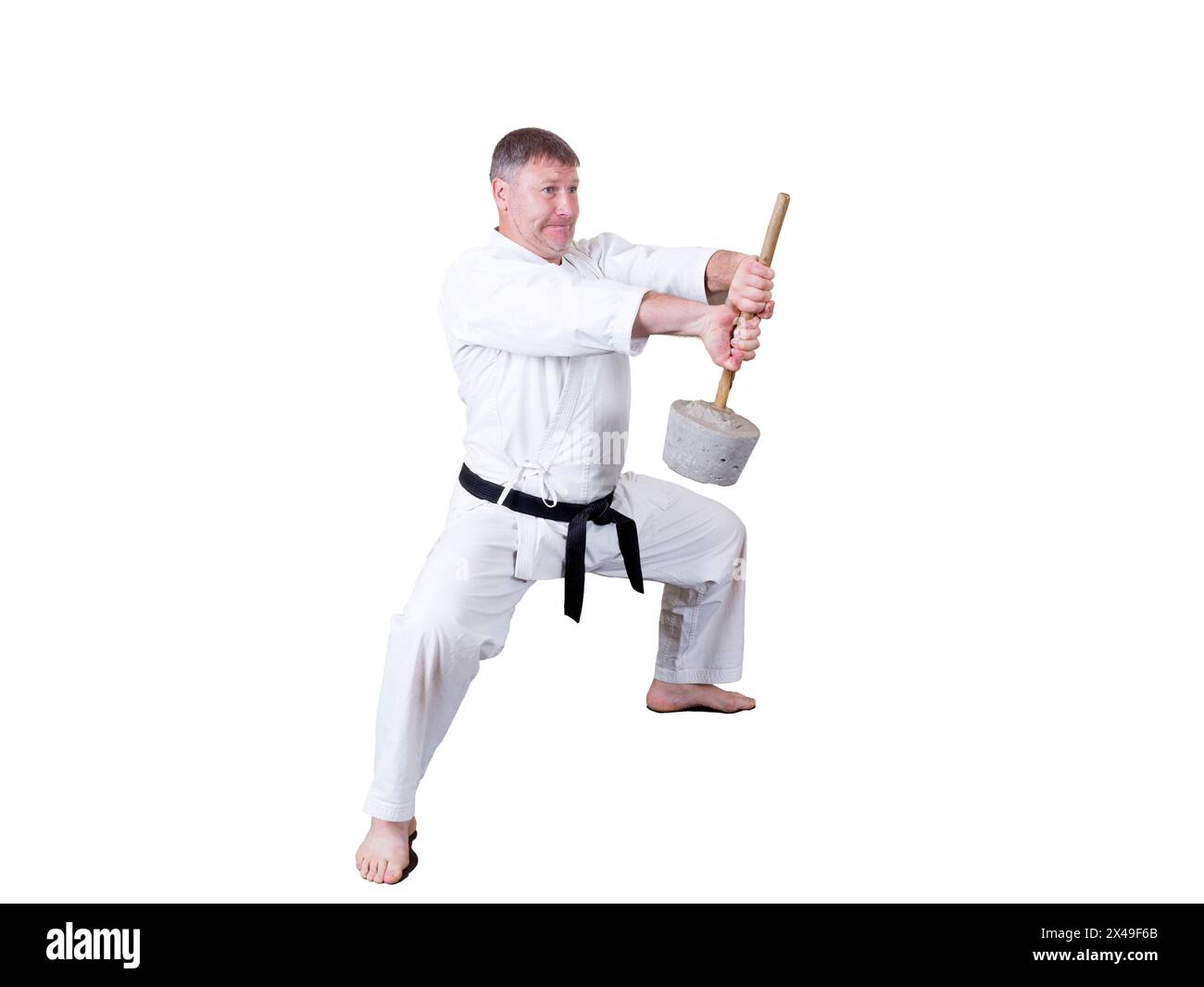 Adult athlete performs formal goju-ryu exercises. It is isolated in a ...