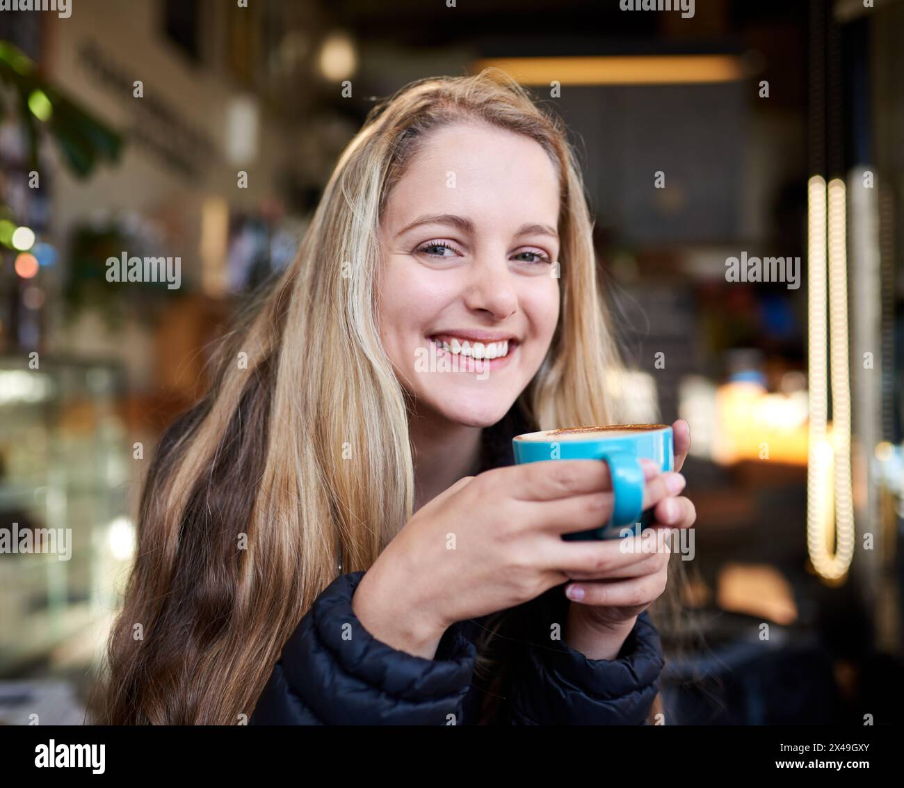 Portrait, laughing or happy woman with coffee in cafe to relax, chill ...
