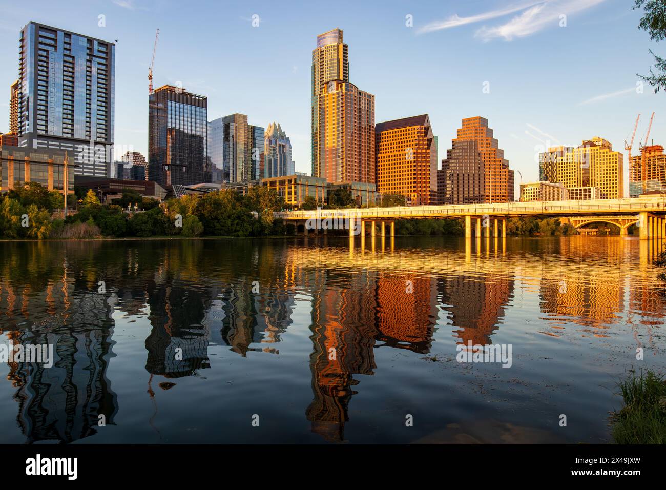 A skyline of the modern city of Austin Texas is captured during golden ...