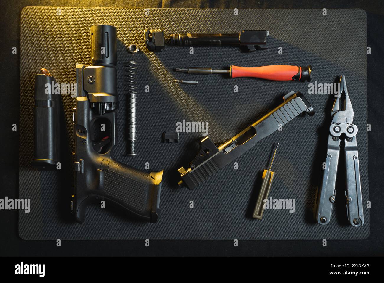 Gunsmithing, cleaning and repairing weapons. Disassembled pistol g19 in ...