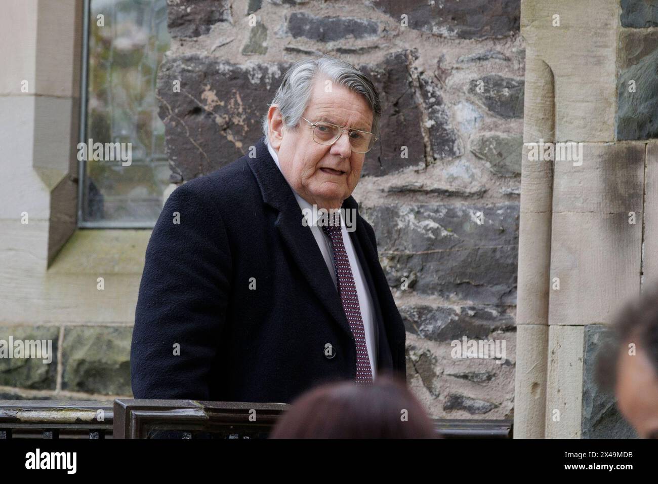 Former BBC Ireland correspondent Denis Murray attends the funeral of ...