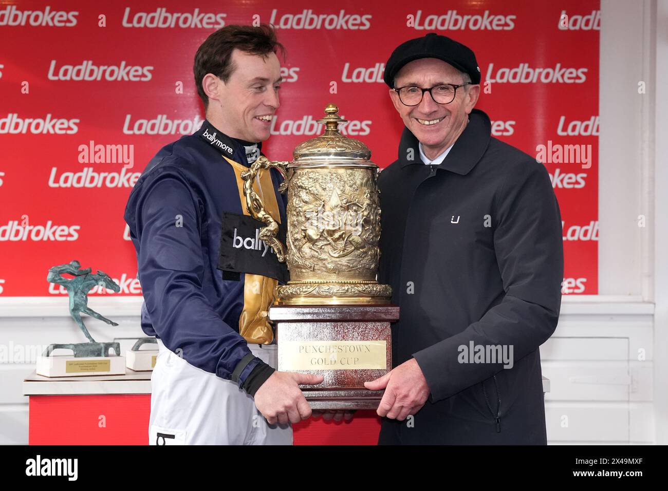 Jockey JJ Slevin (left) and trainer Martin Brassil with the Punchestown ...