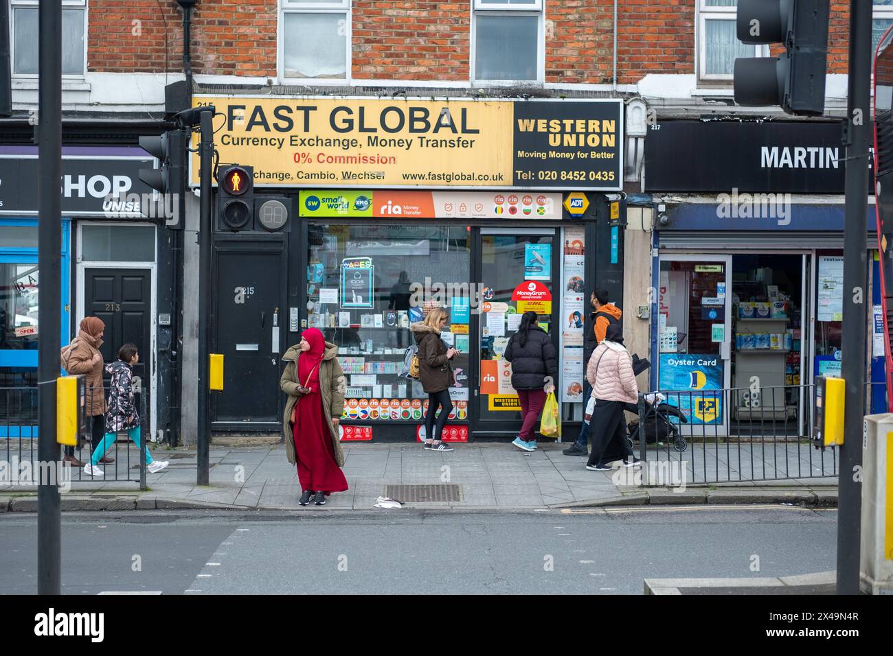 LONDON- APRIL 3rd, 2024: Western union and currency exchange on ...