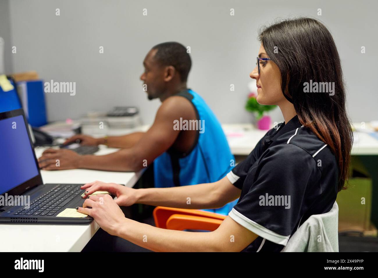 Person trainer, laptop and people in gym for coach planning, schedule ...