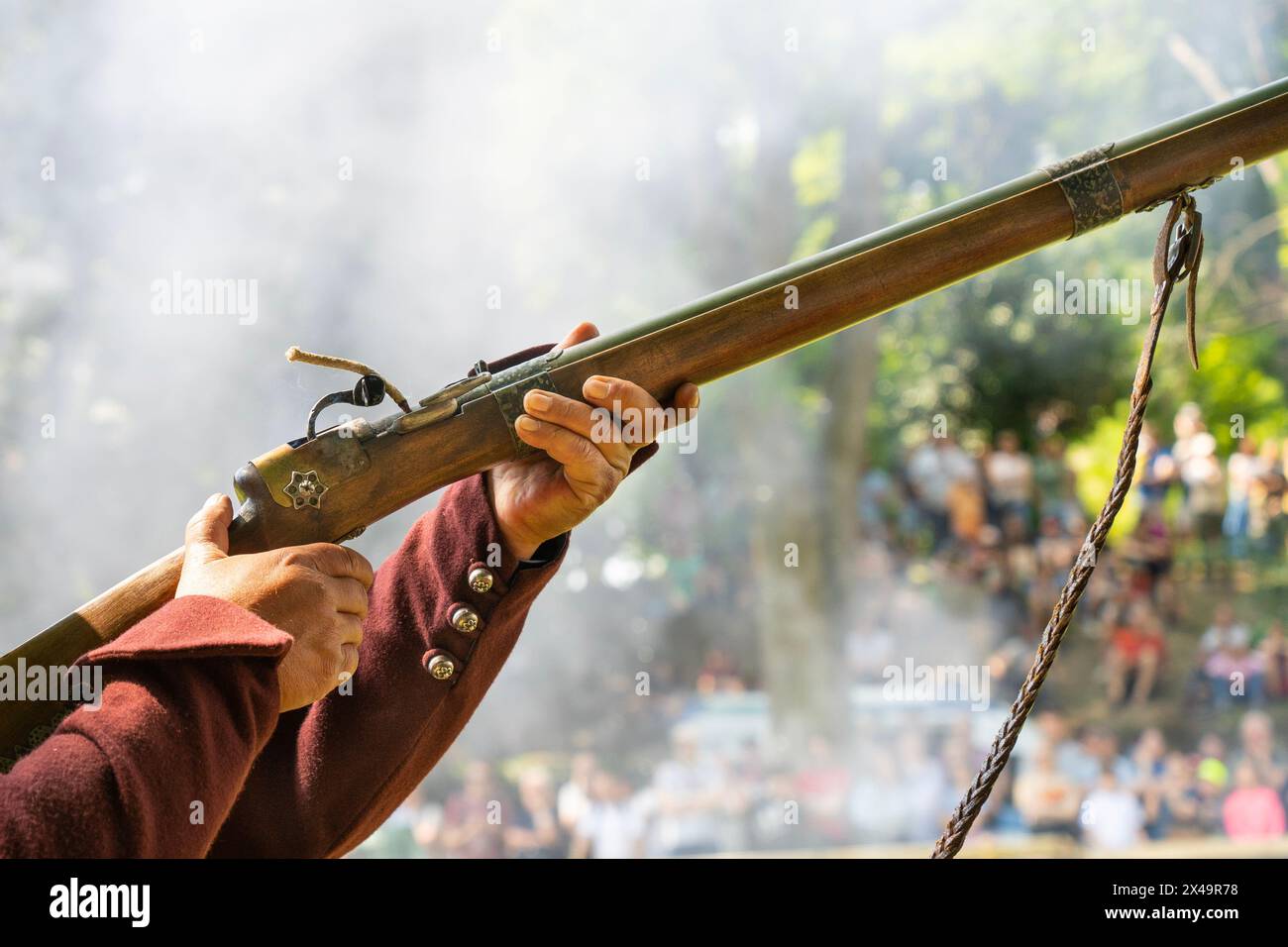 Shooting with a medieval musket at a demonstration Stock Photo - Alamy
