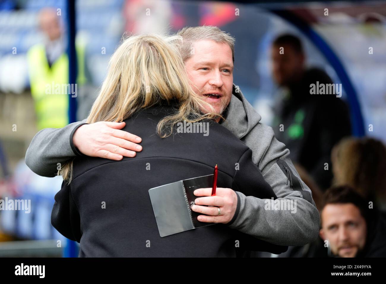 Chelsea manager Emma Hayes greets Liverpool manager Matt Beard (right ...