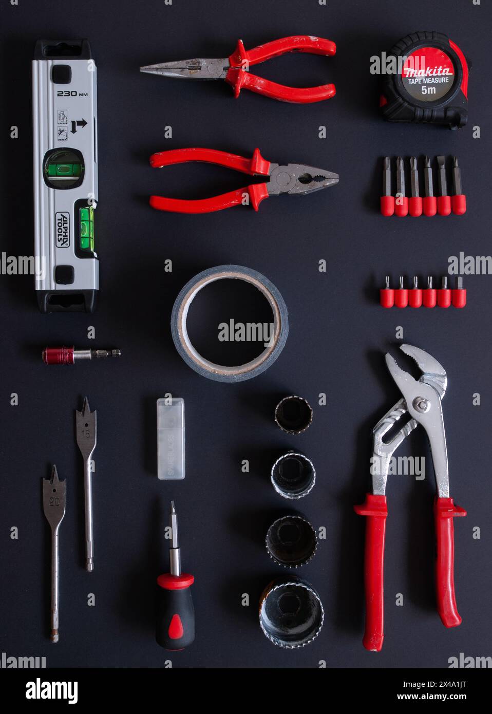 Work tools isolated on black background. Hand tool new set with rubber ...
