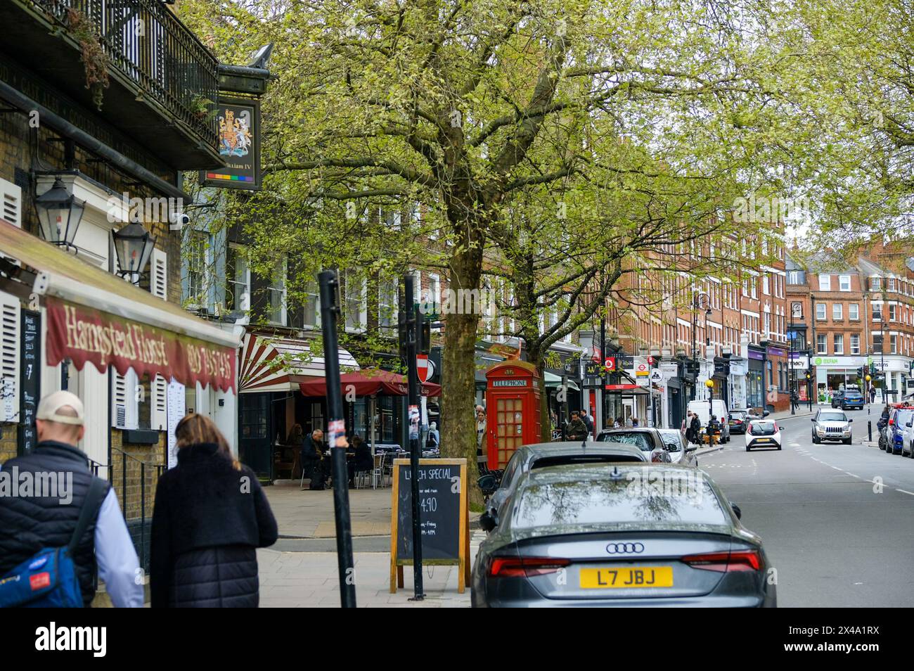 LONDON- APRIL 22, 2024: Hampstead Village high street scene- an ...