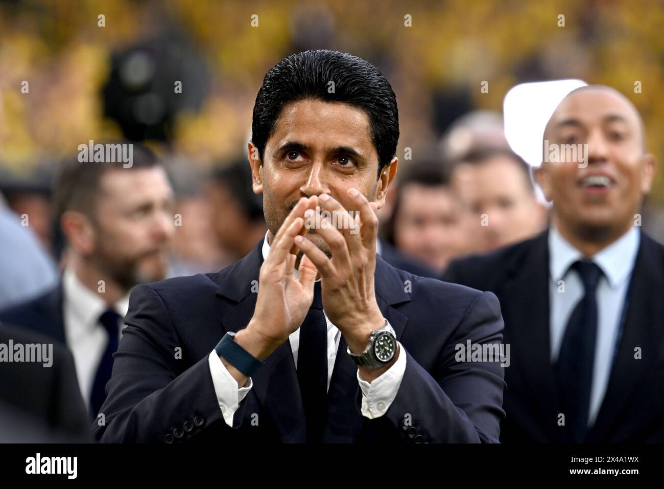 Paris Saint-Germain president Nasser Al-Khelaifi applauds the fans before the UEFA Champions ...