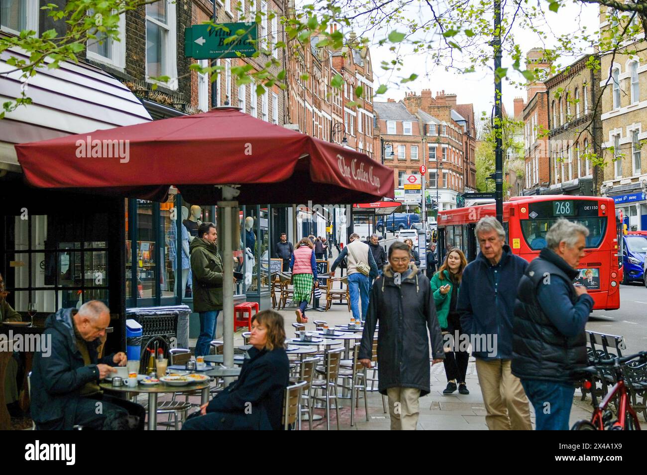 LONDON- APRIL 22, 2024: Hampstead Village high street scene- an ...