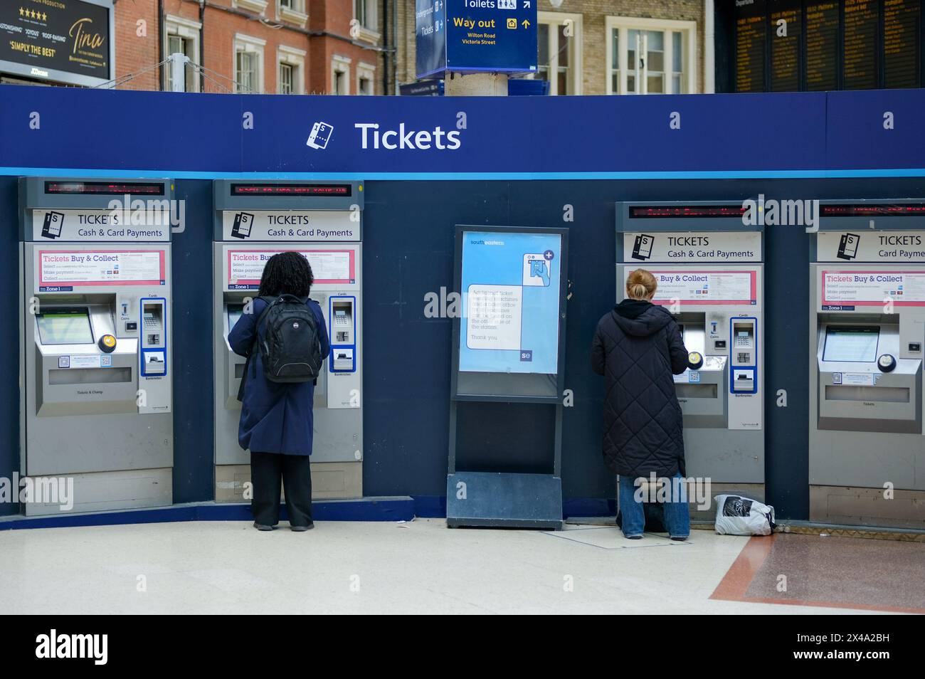 LONDON- APRIL 29, 2024: Ticket machines inside London Victoria station ...