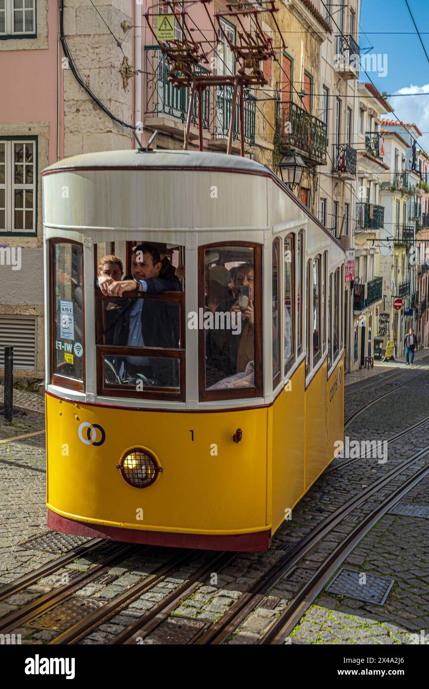 LISBON,PORTUGAL-APRIL 7, 2024:The Bica Funicular (Ascensor da Bica), or ...