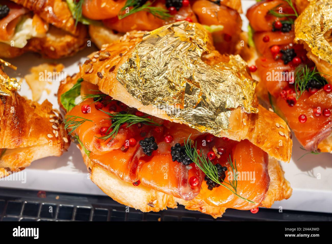 Butter puff croissants on display in artisanal bakery in London, filled ...
