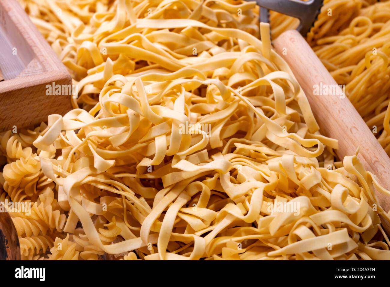 Italian food, fresh homemade pasta tagliatelle ready to cook on ...