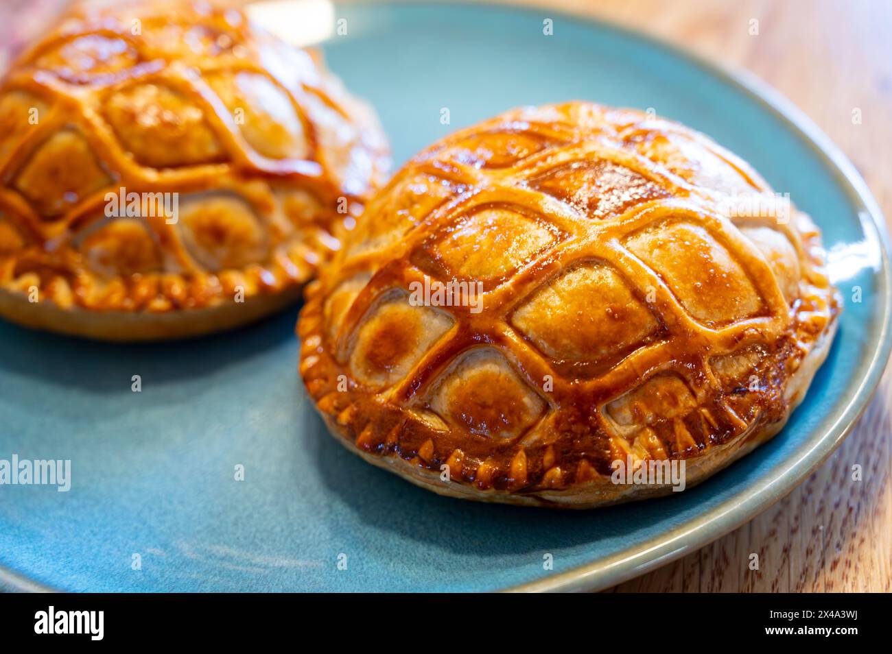 Fresh baked in oven mini pulled chicken wellington pies, Britisch ...