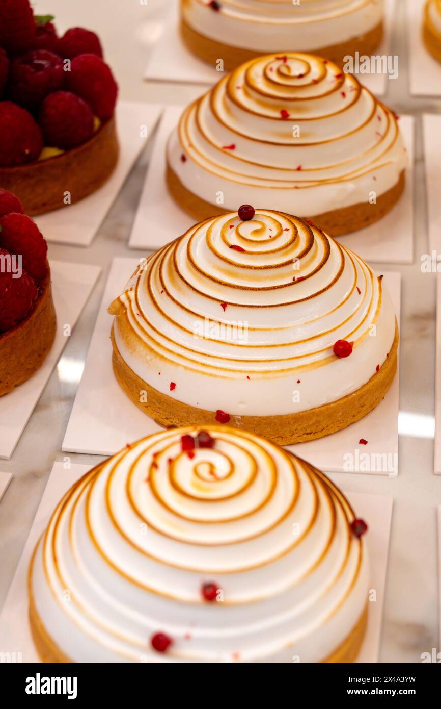 Sweet dessert fresh baked meringue cakes in bakery shop Stock Photo - Alamy