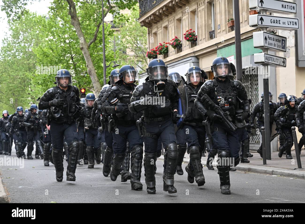 Paris, France. 01st May, 2024. Riot police take position as clashes ...