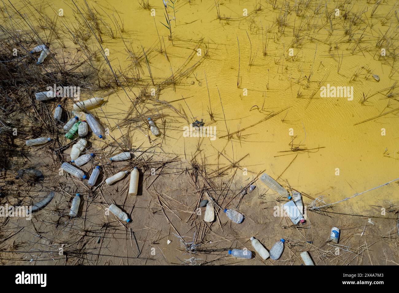 Drone aerial of lake polluted with waste garbage. Environmental ...