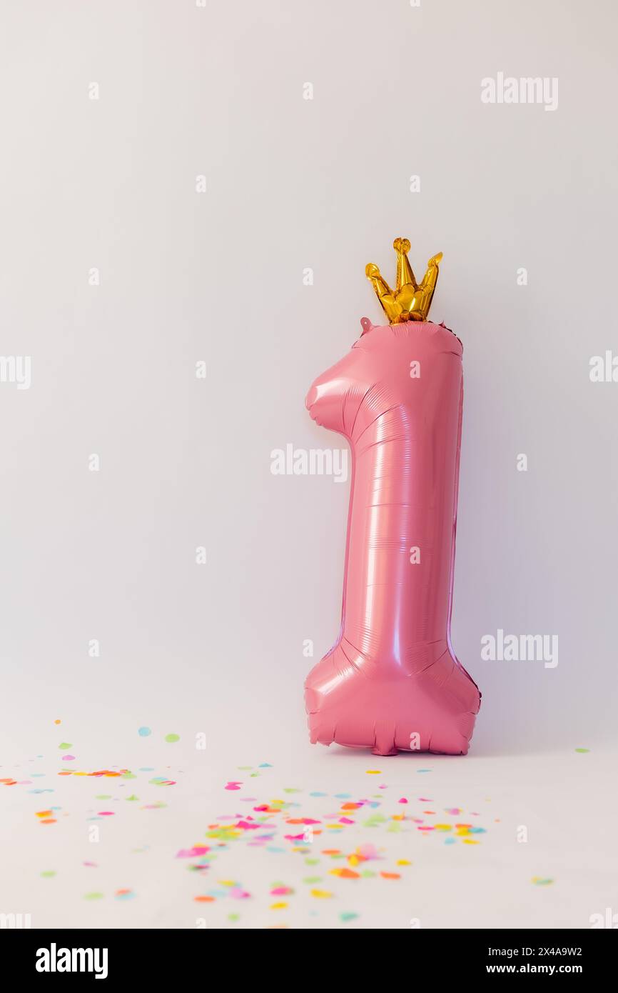 pink ball in the shape of a number one on a white background. High ...