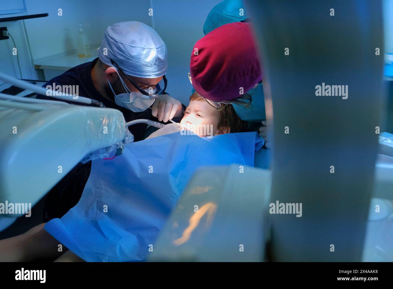 4 years old male child being cured in a dentist clinic Stock Photo - Alamy