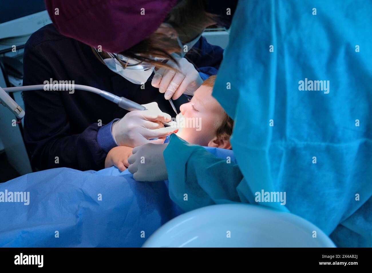 4 years old male child being cured in a dentist clinic Stock Photo - Alamy