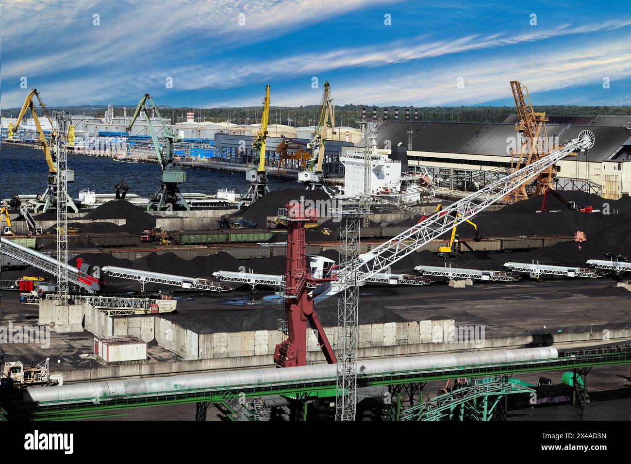 Sea trade port with coal terminal and liquid cargo complex behind Stock ...