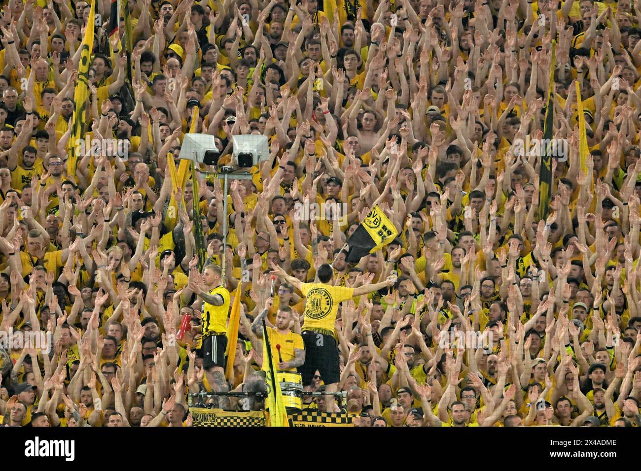 Borussia Dortmund fans cheer on their team during the UEFA Champions ...