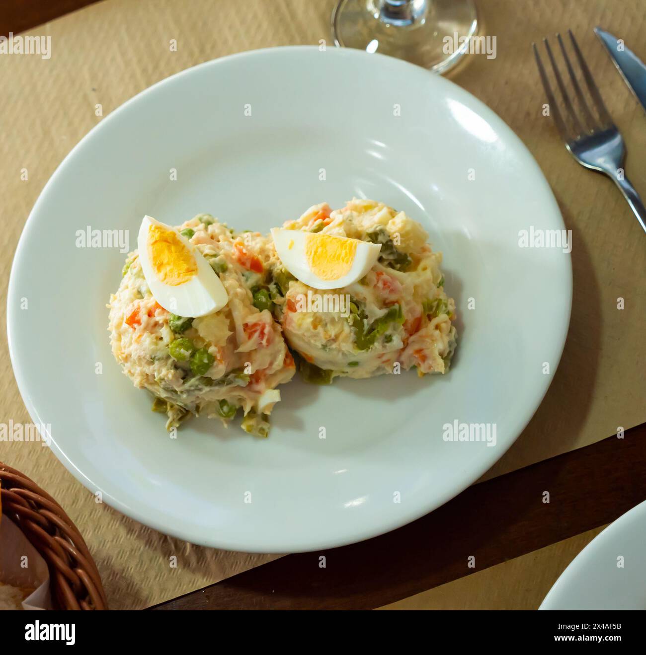 Spanish salad called Ensalada rusa Stock Photo - Alamy