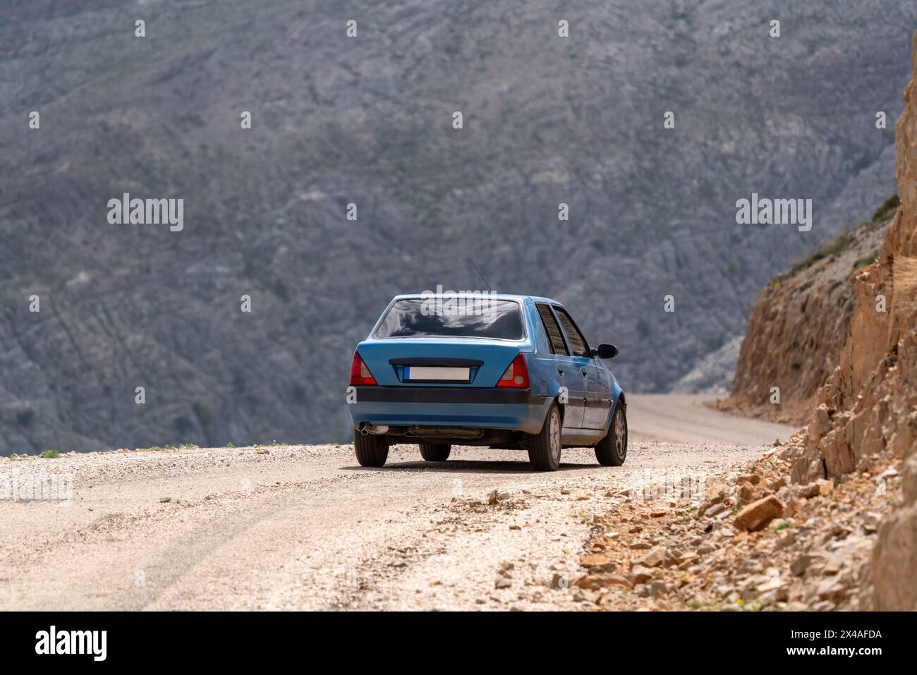 A car travelling on high plateau dirty roads in Turkey Stock Photo - Alamy