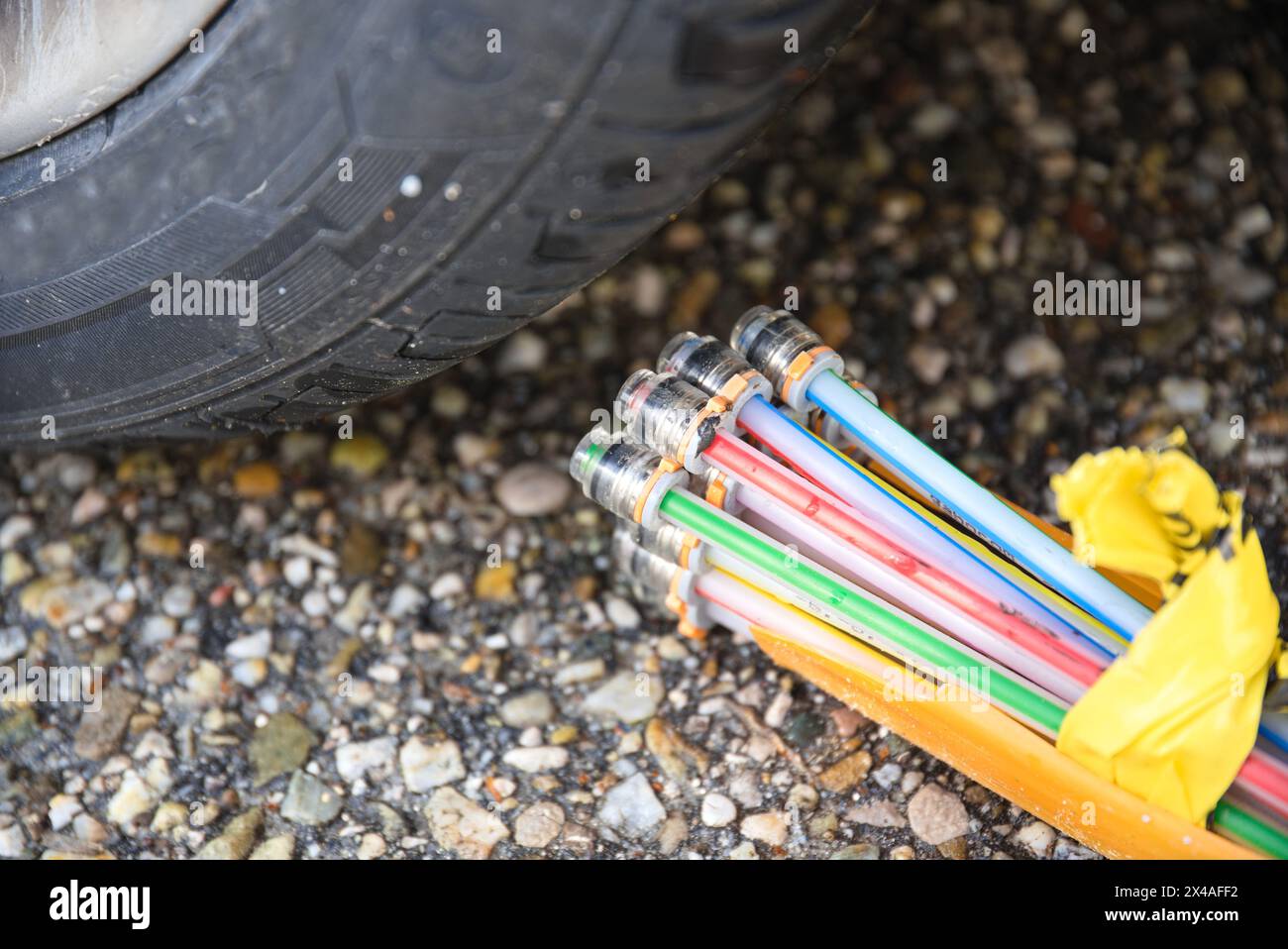 Fiber Optic Connection On Car Tire And Fast Internet Connection - Close ...