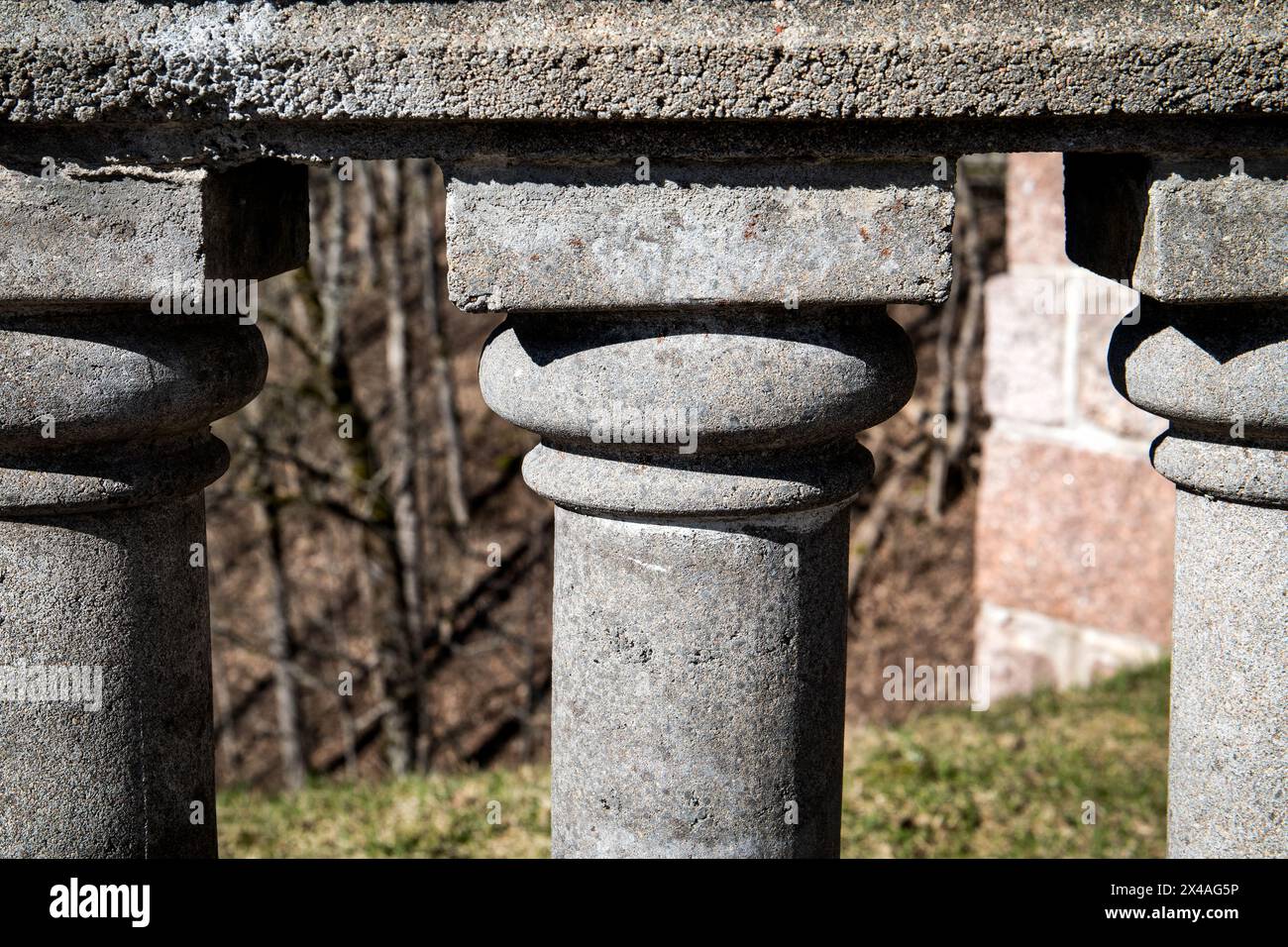 Concrete columns, marble fencing. Architecture and landscaping. Garden ...