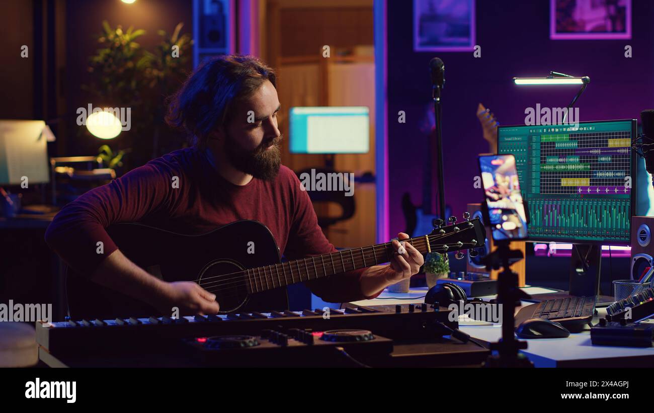 Skilled artist guitarist recording hi-res stock photography and images ...