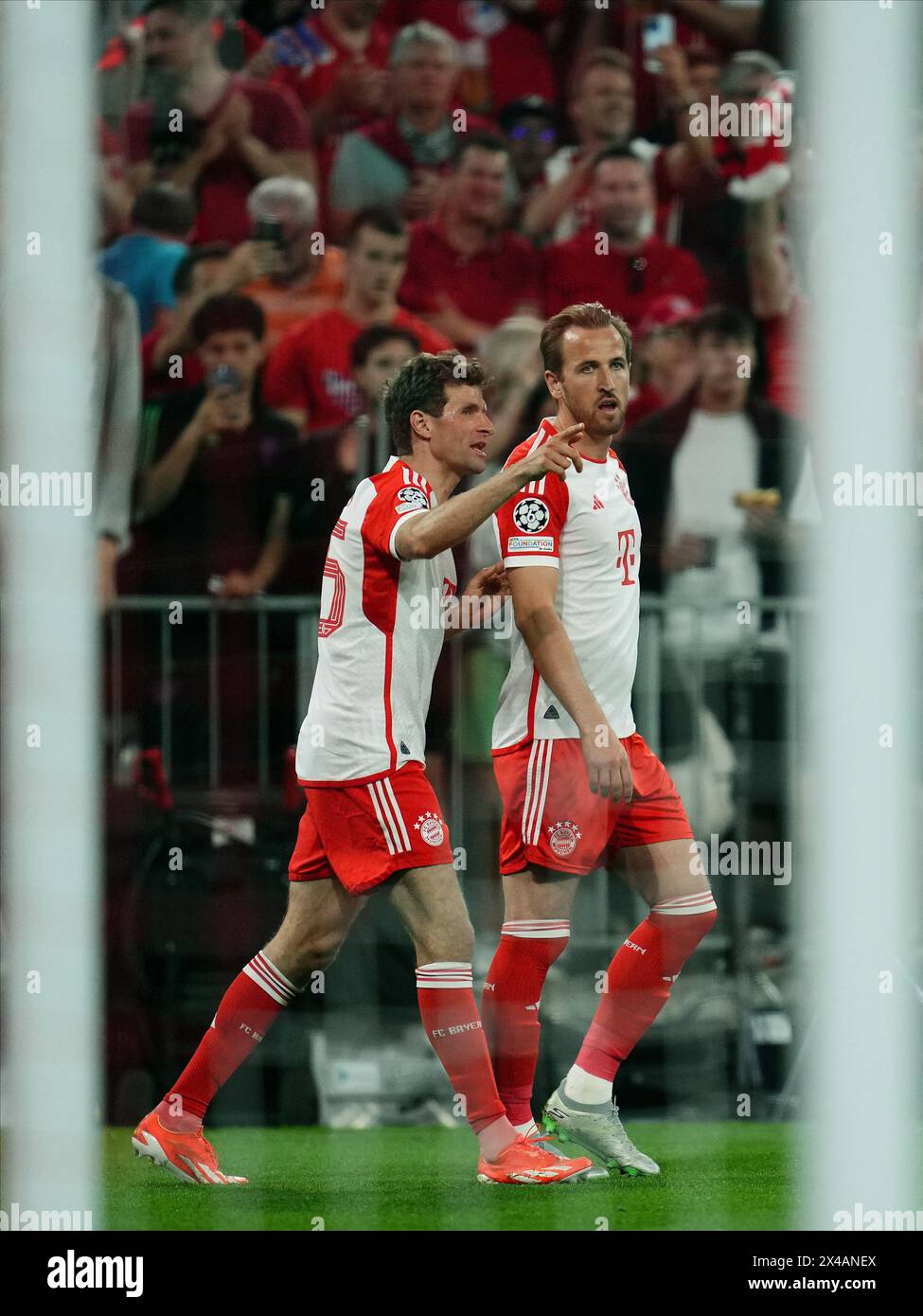 Munich, Germany. 30th Apr, 2024. Thomas Muller and Harry Kane of Bayern ...