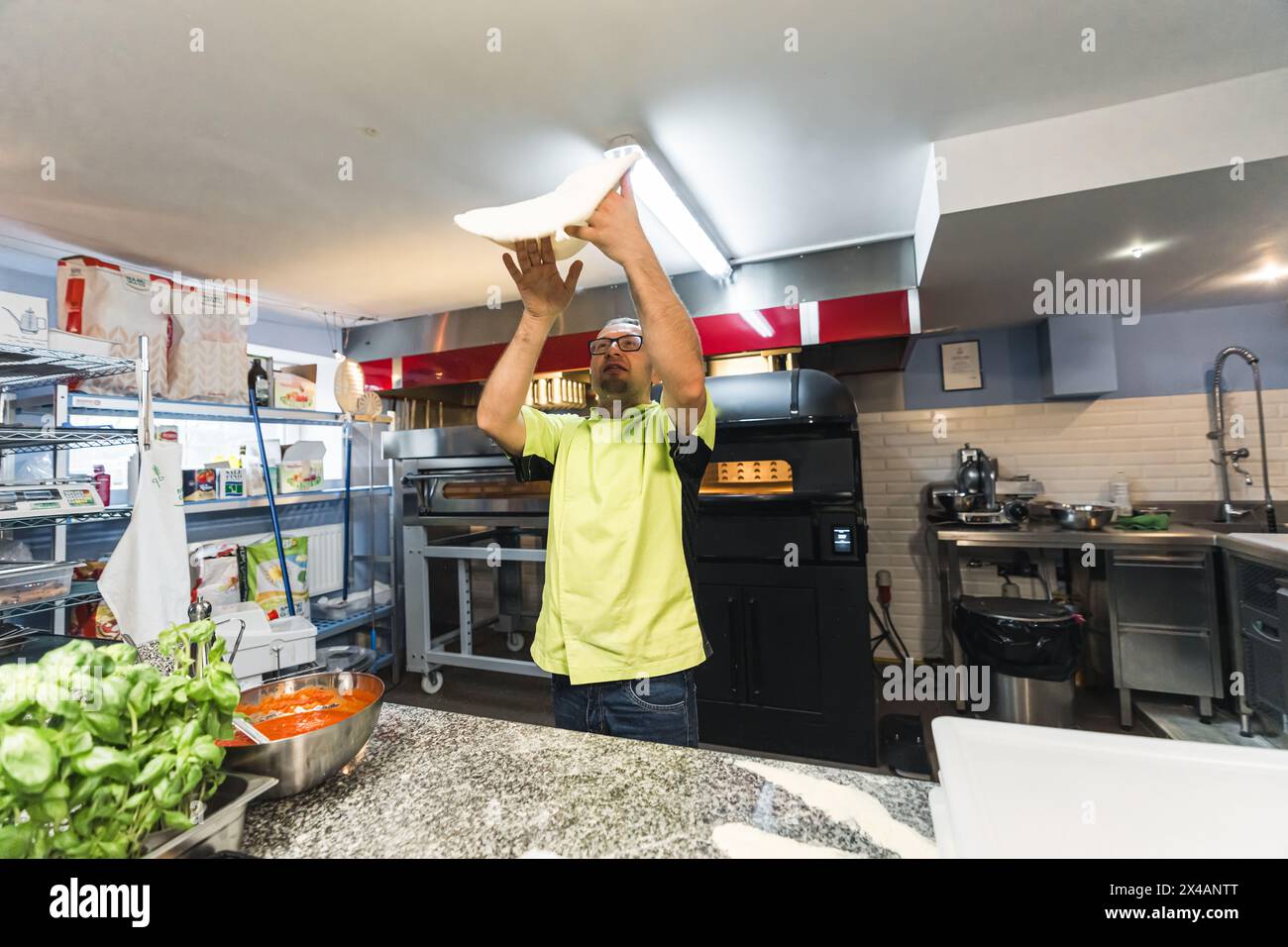 Pizza dough spinning hi-res stock photography and images - Alamy