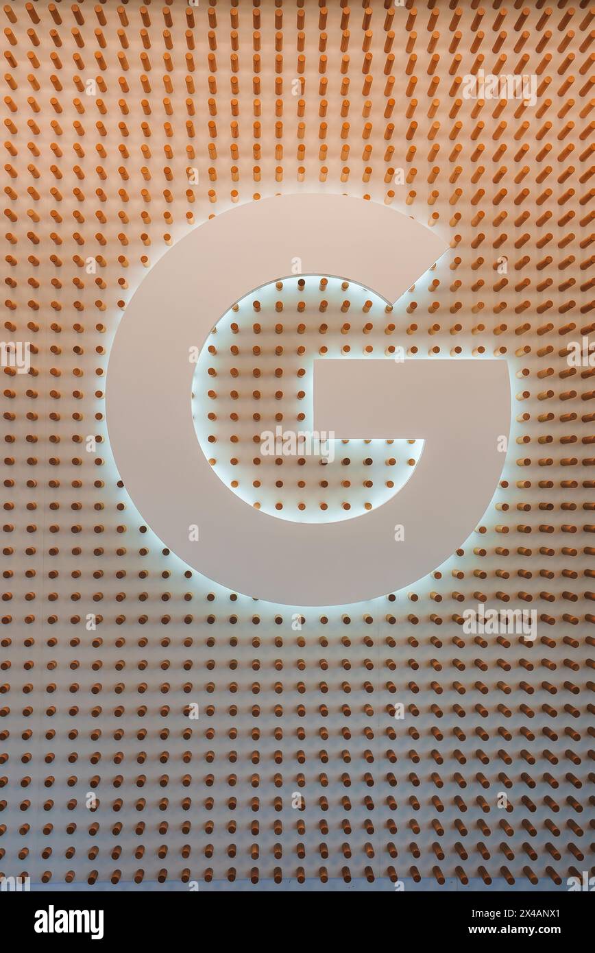 Modern Letter G Design on Textured Wall, Warm Backlit Glow Stock Photo ...