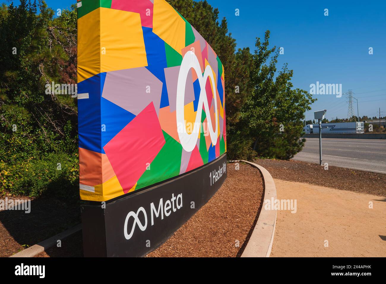 Colorful 'Meta' sign with geometric design on corporate campus Stock ...