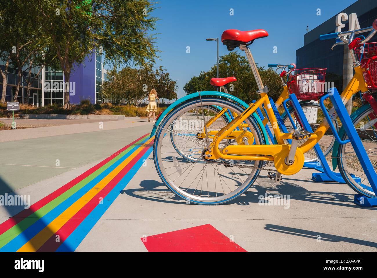 Colorful Bicycle Scene with Modern Building and Trees, Urban Setting ...