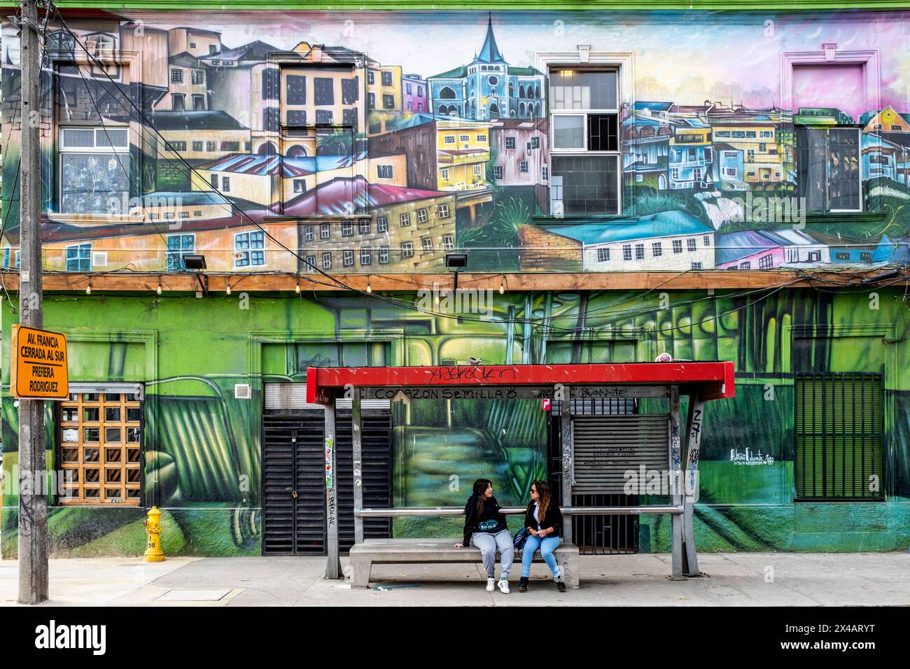 Two Women Chatting At A Bus Stop In The City of Valparaiso, Valparaiso ...