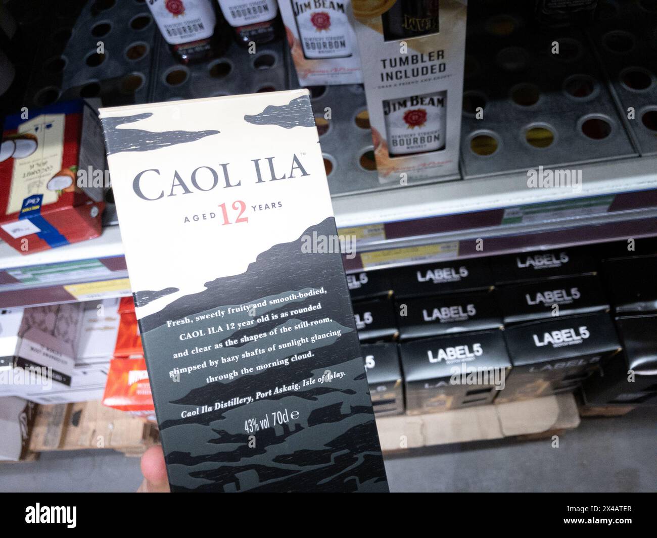 Picture of the logo of Caol Ila on some whisky bottles for sale in ...