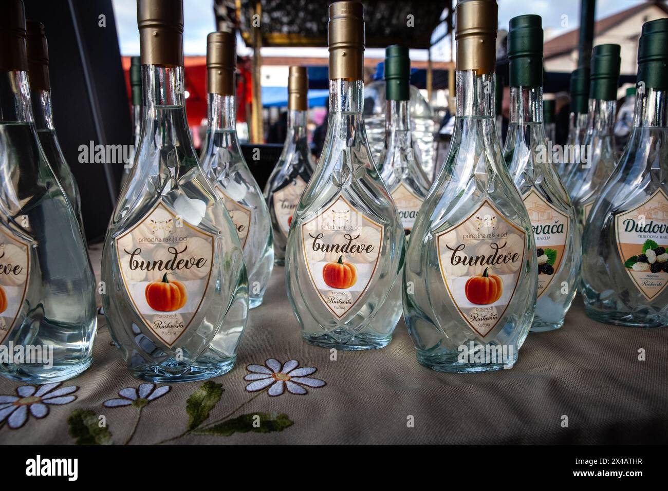 Picture of various rakijas displayed In Belgrade, in a market, in ...