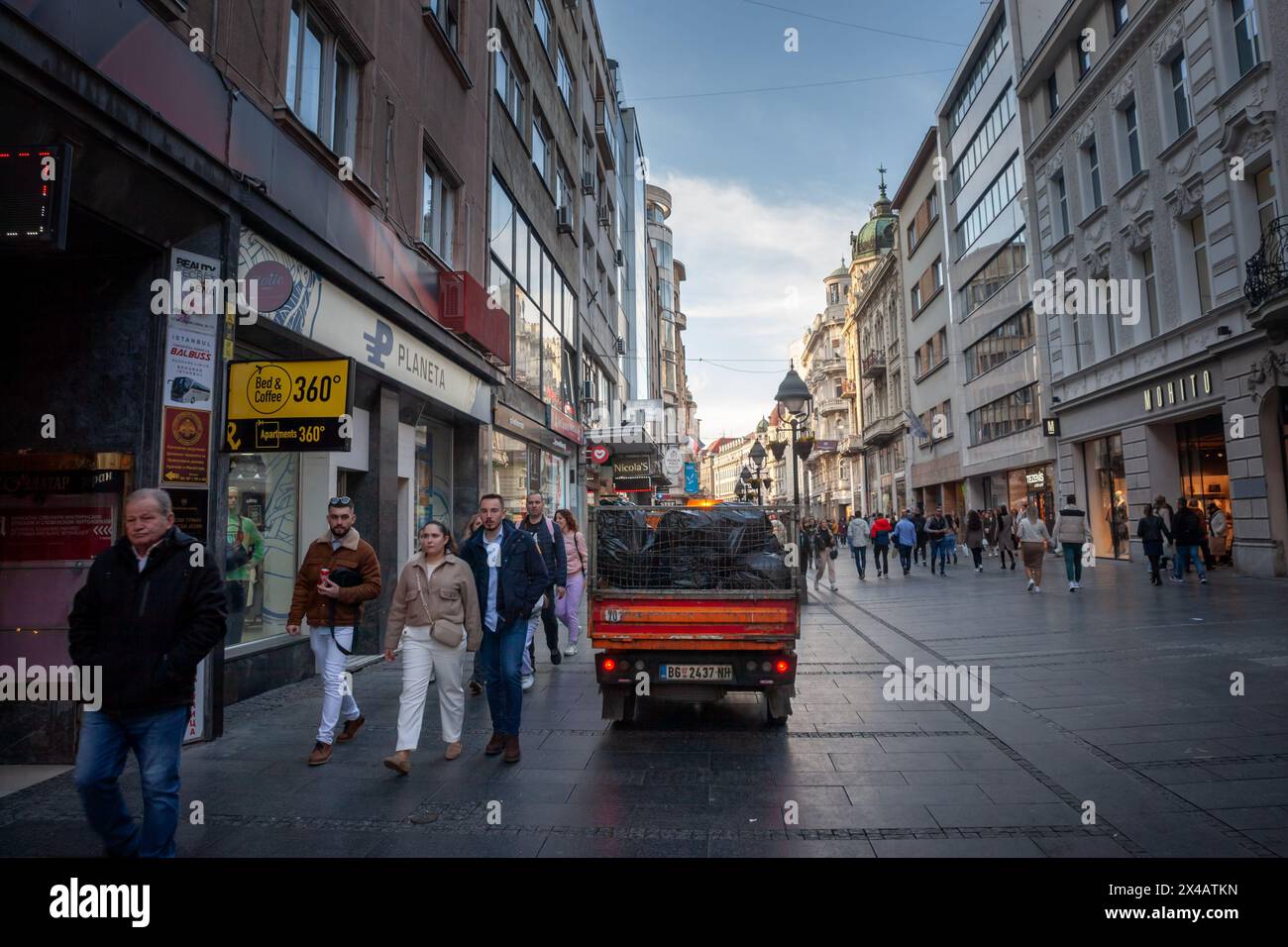 Picture of a garbage truck passing by the main street of belgrade ...